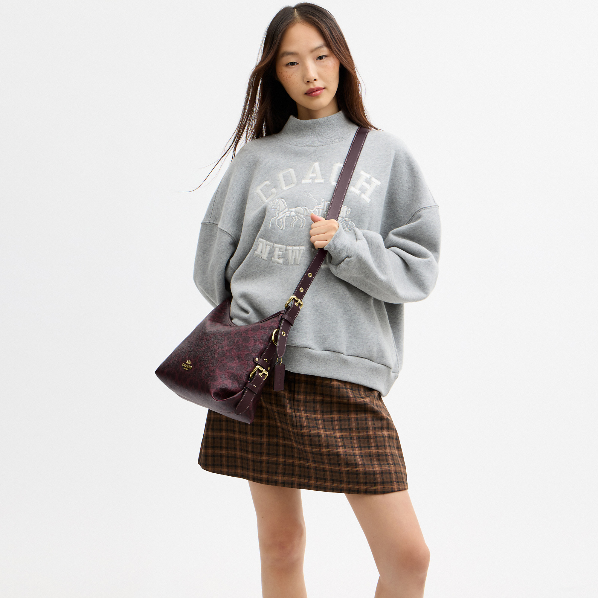 COACH OUTLET laurel shoulder bag with buckles in signature canvas